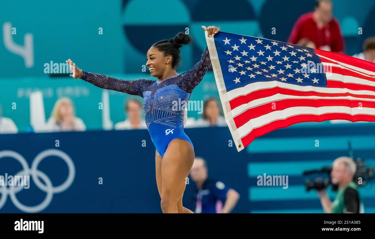 Simone Biles (USA) of the United States celebrates with the fans after ...