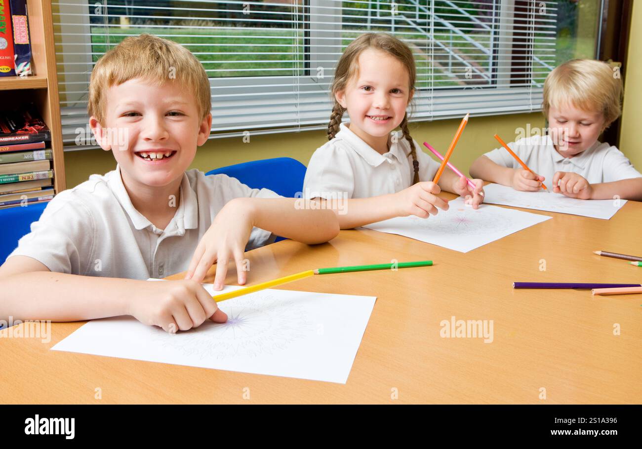 Elementary School: Pupils working together. Bright smiles and eye ...