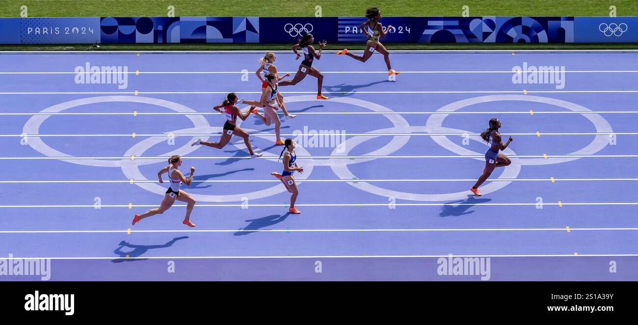 a2418 of a2418#4, competes in the Women's 200m Round 1 at the Stade de ...