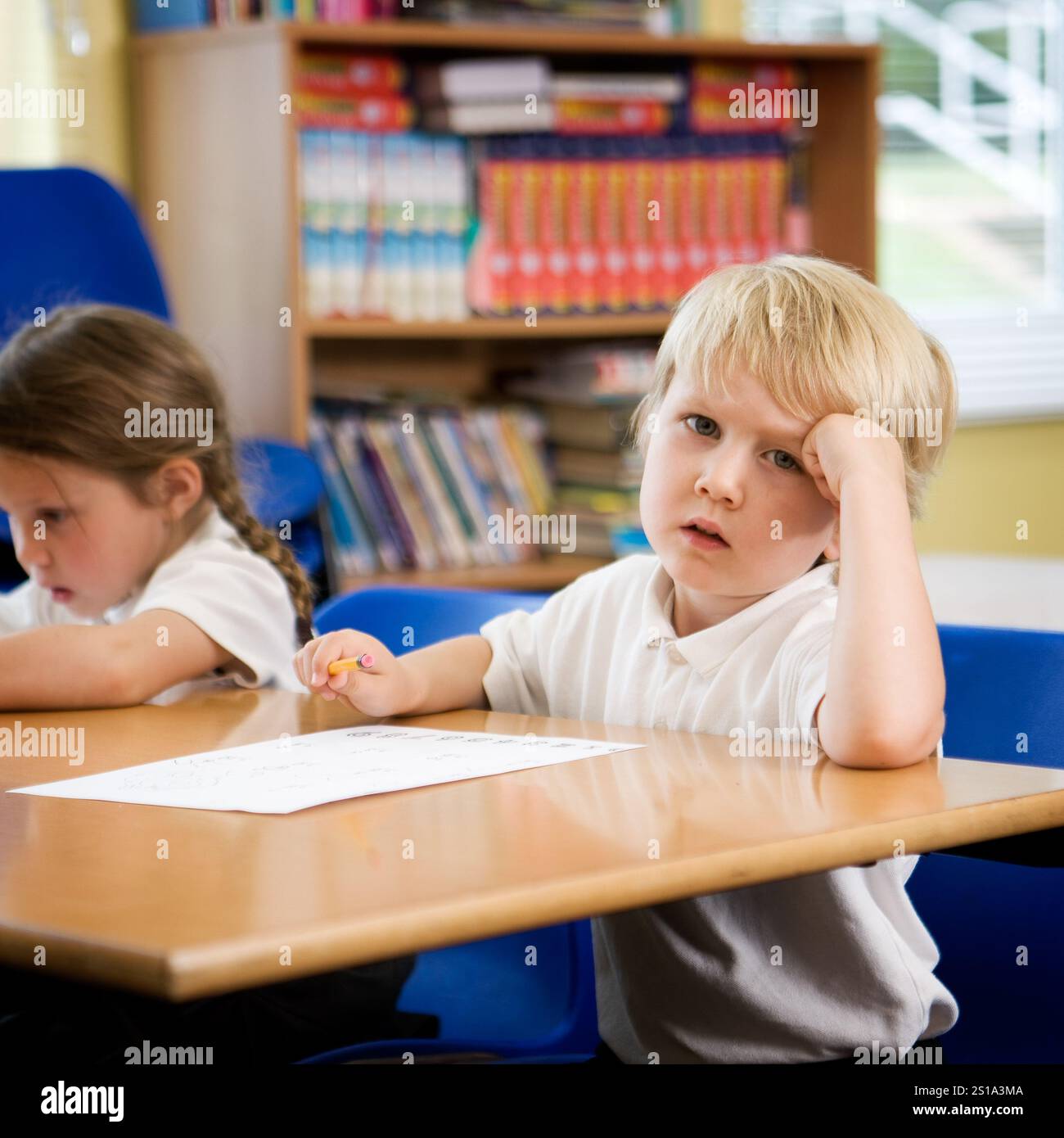 Elementary School: Early Learner. A young primary school boy ...