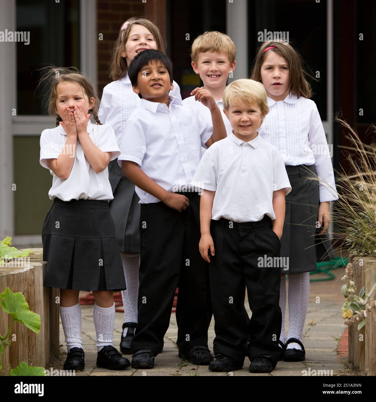 Elementary School: Junior Friends. A relaxed full-length portrait of a ...