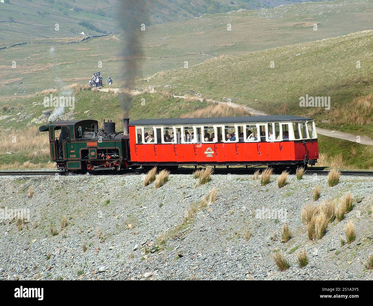 The steam locomotive 'Snowdon' is pictured climbing towards the summit on the Snowdon Mountain ...