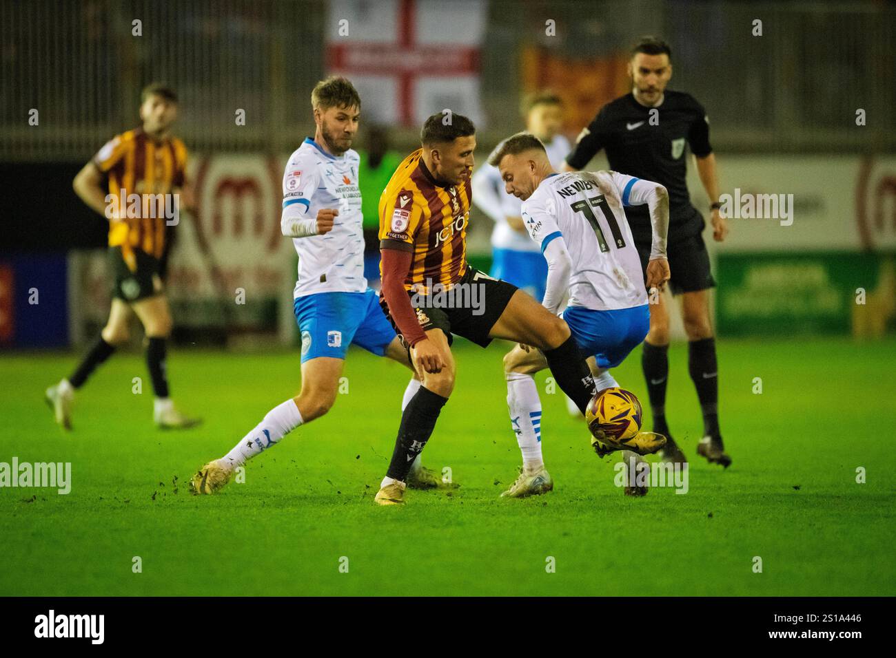 Barrow's Sam Foley and Elliot Newby battles for possession during the ...
