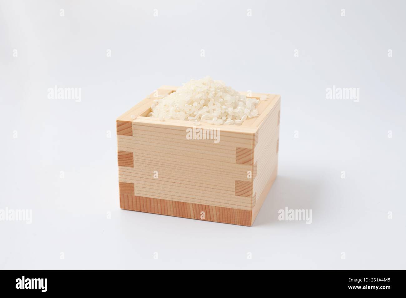 Japanese raw rice in wodden box isolated on white background Stock ...