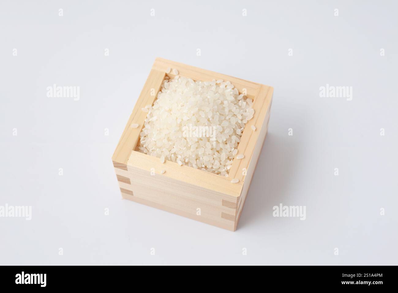 Japanese raw rice in wodden box isolated on white background Stock ...
