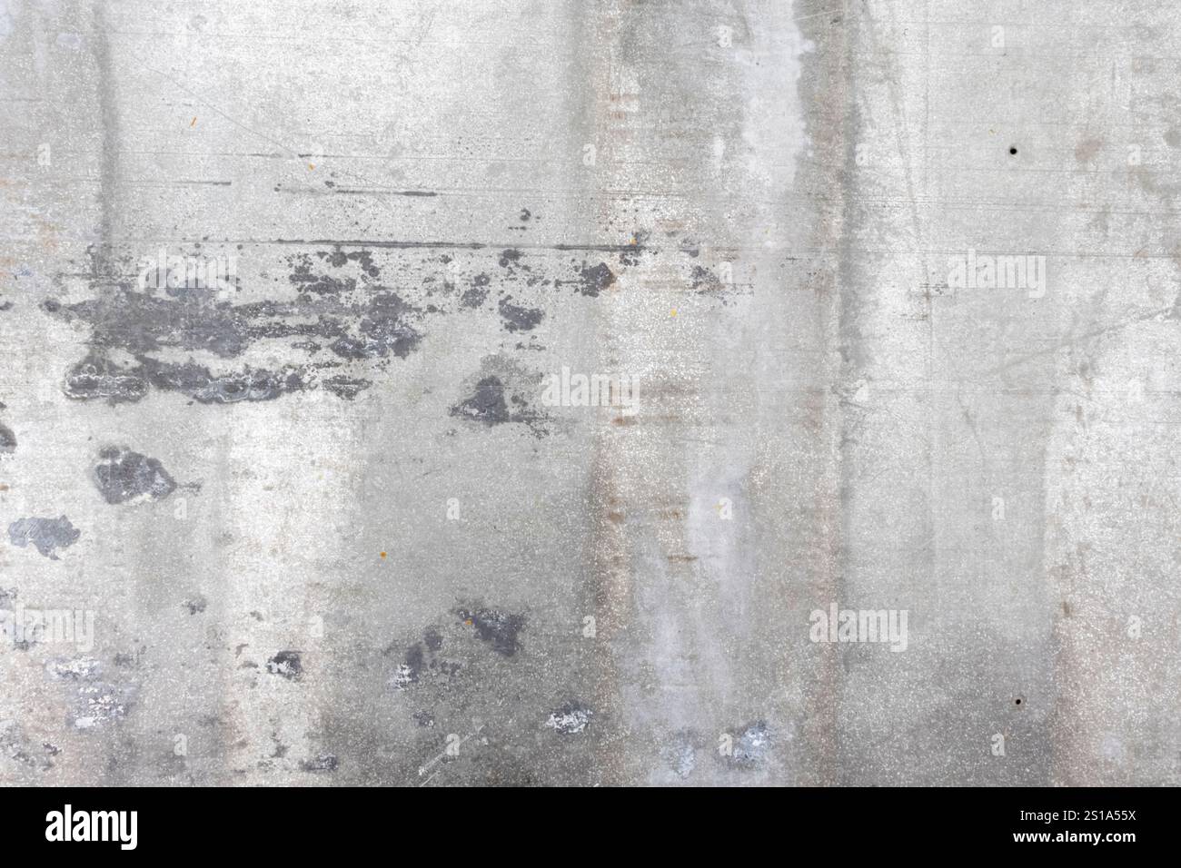 A rough concrete texture with visible weathering and natural patterns ...