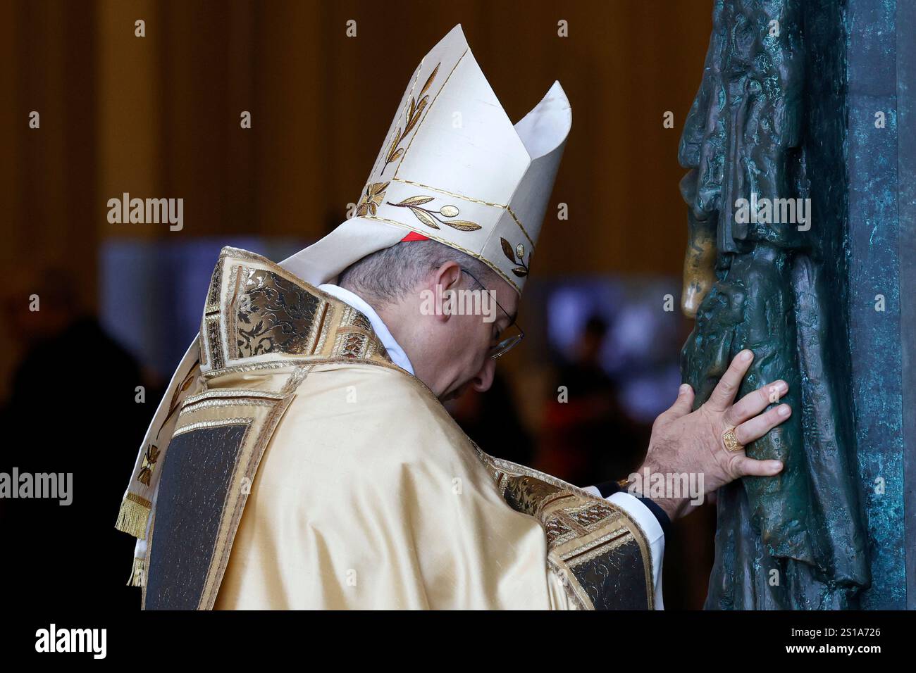 Rome’s Cardinal Vicar Baldassare Reina opens the Holy Door of the St ...