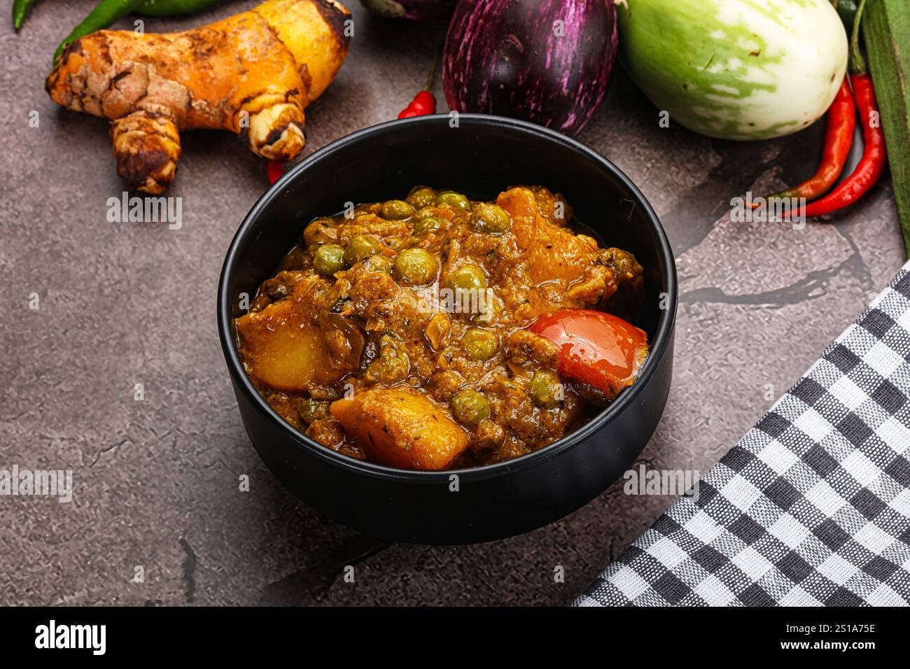 Indian traditional cuisine Aloo mutter - potato with green peas Stock ...
