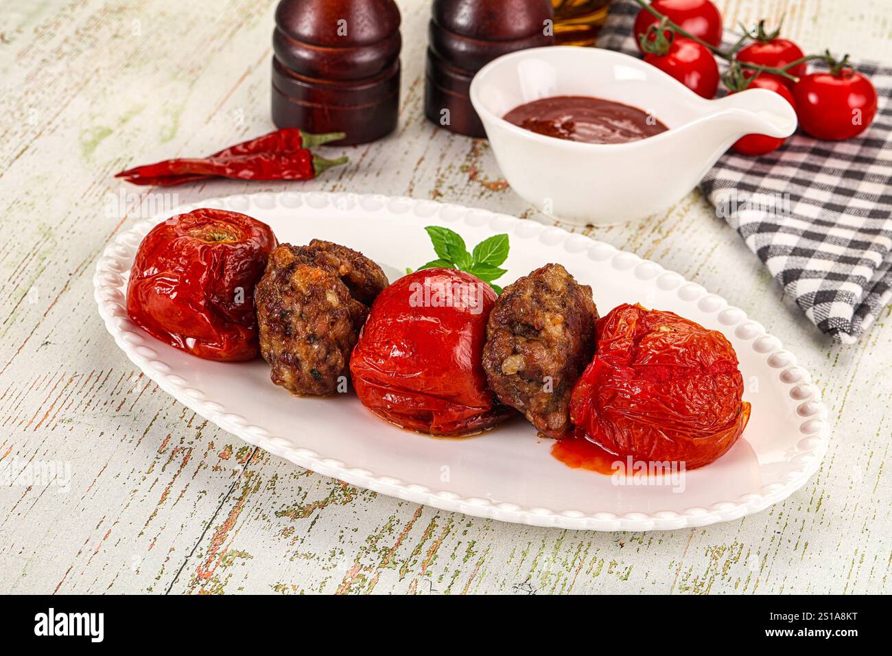 Turkish cuisine - Domatesli Kebab with minced meat and tomato Stock ...