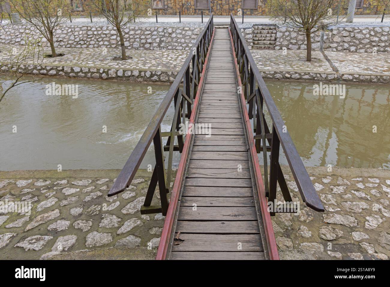 Wood Planks Pedestrian Bridge With Fence Over Small River Stream Stock ...
