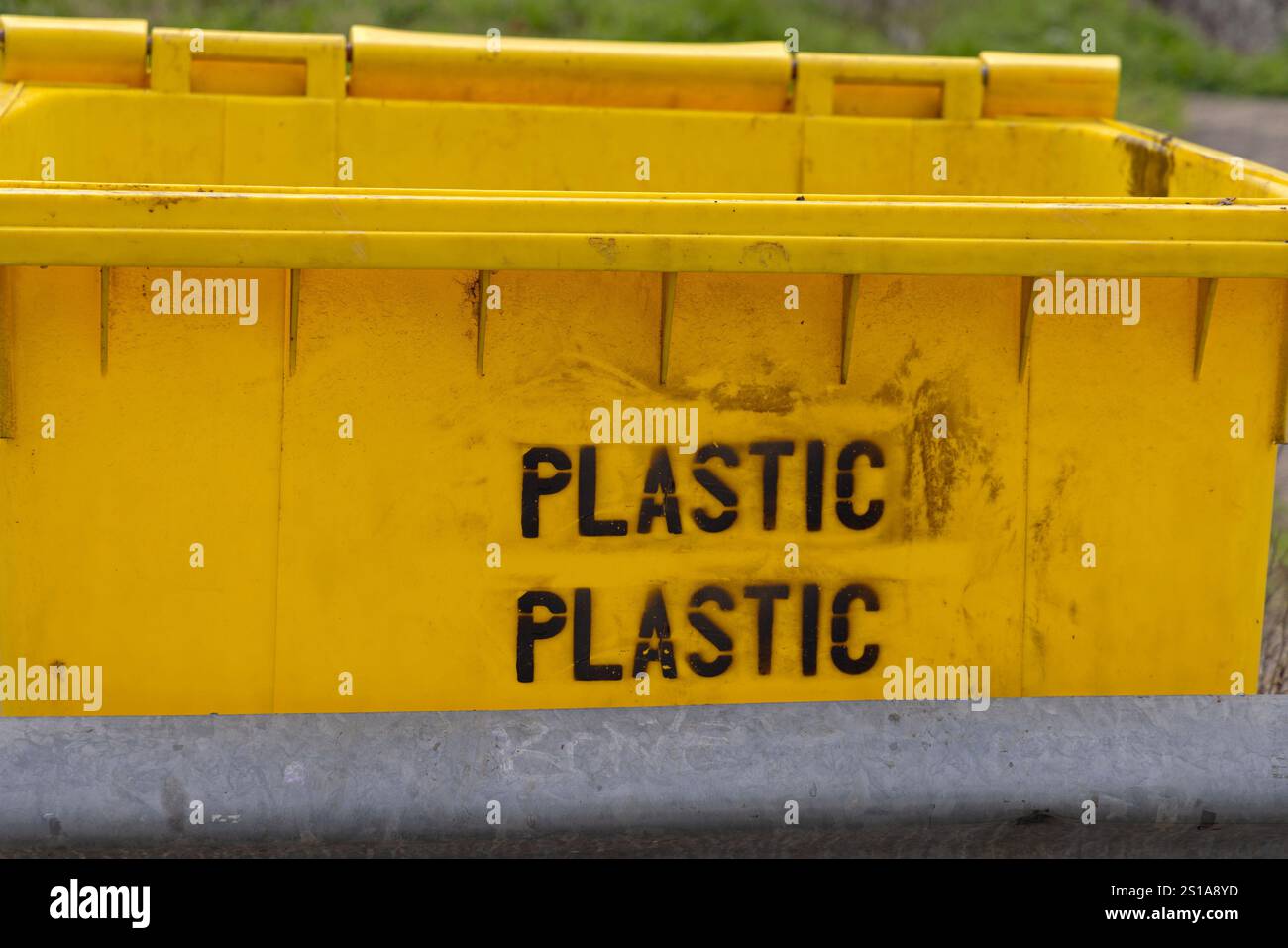 Sorting and Recycling Trash Large Yellow Plastic Bin With Stencil Sign ...
