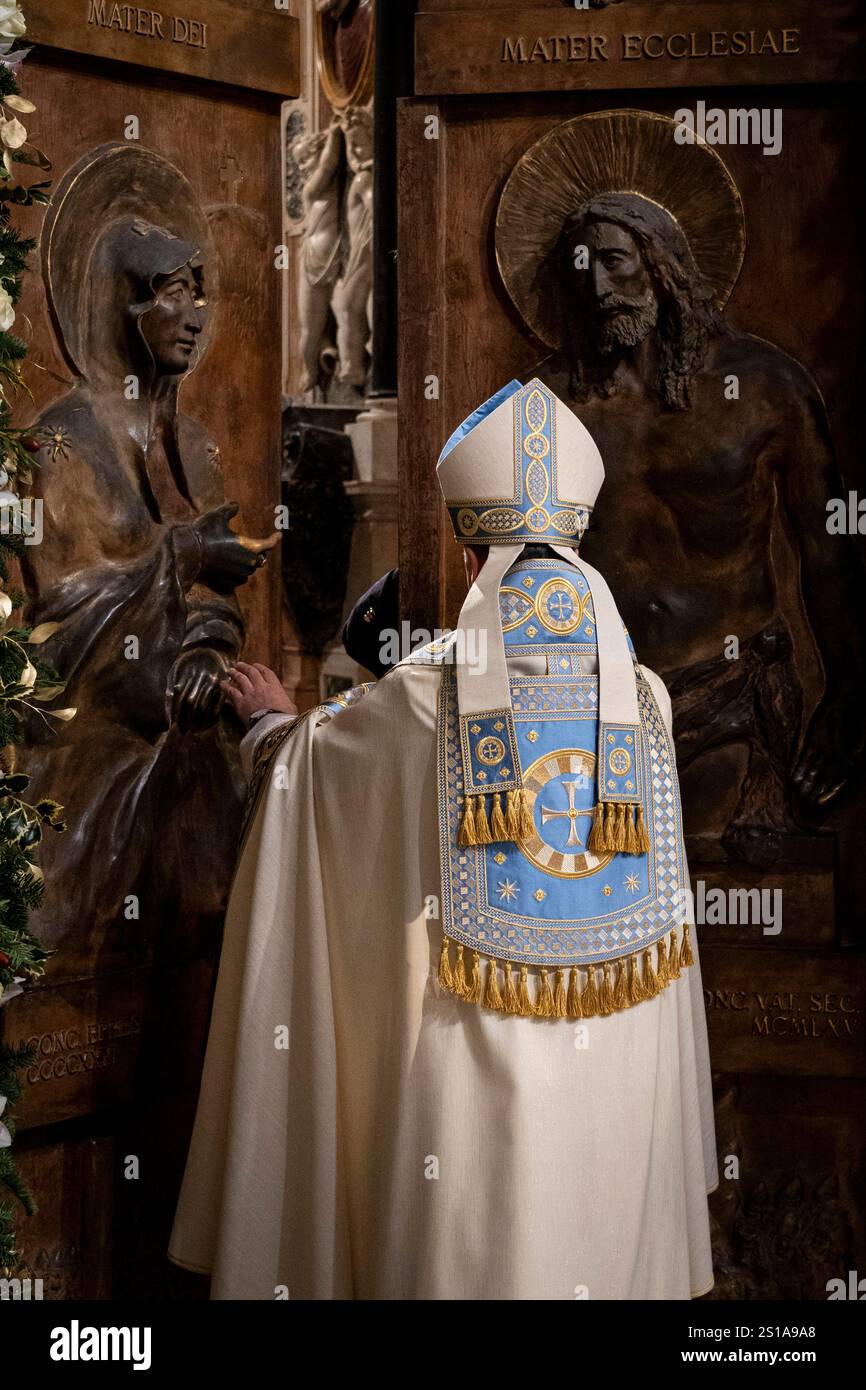 Rome, Italy. 1st Jan, 2025. Cardinal Rolandas Makrickas opens the Holy ...