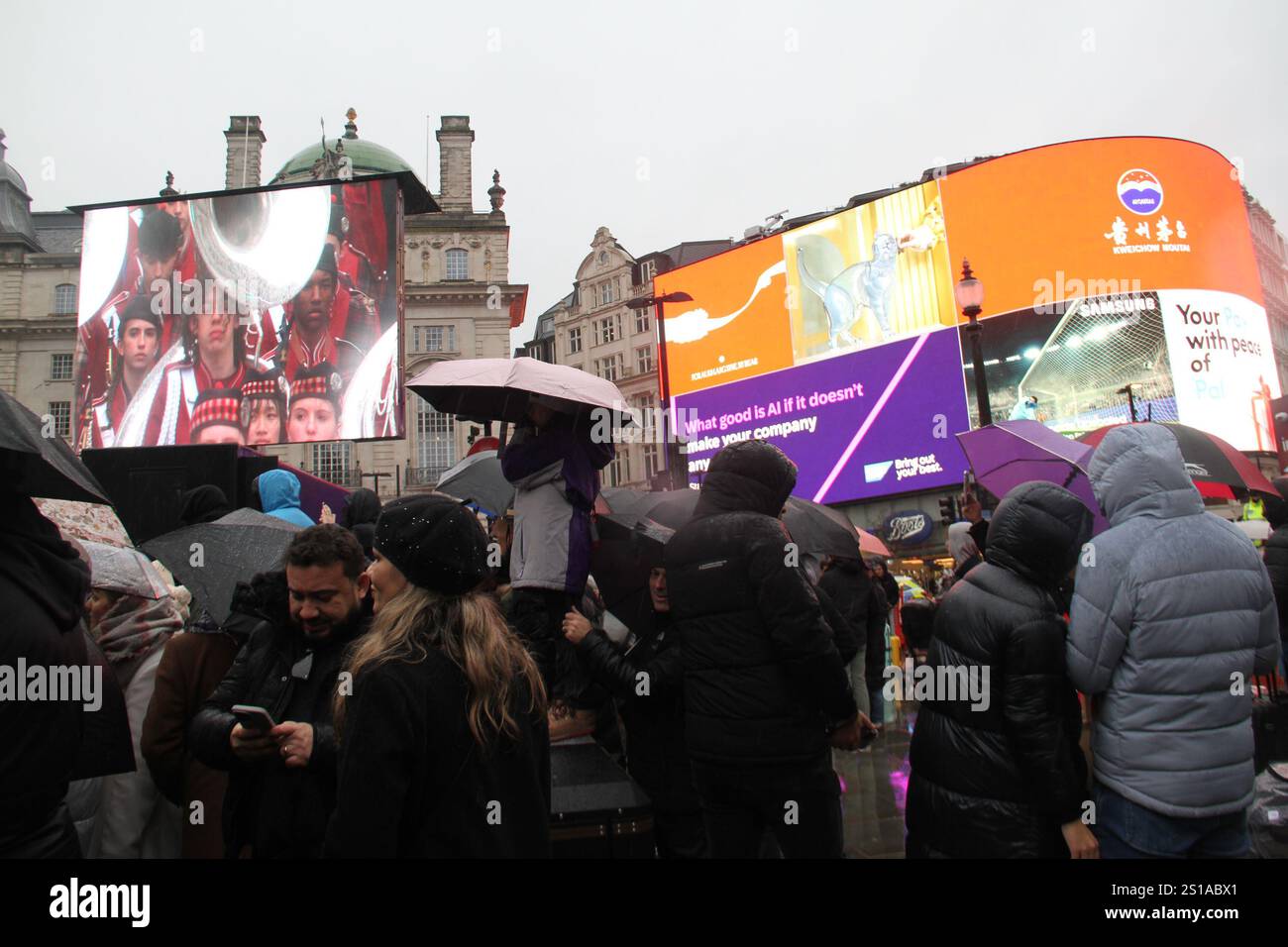 Participants braved the rain to catch a glimpse of the parade at ...
