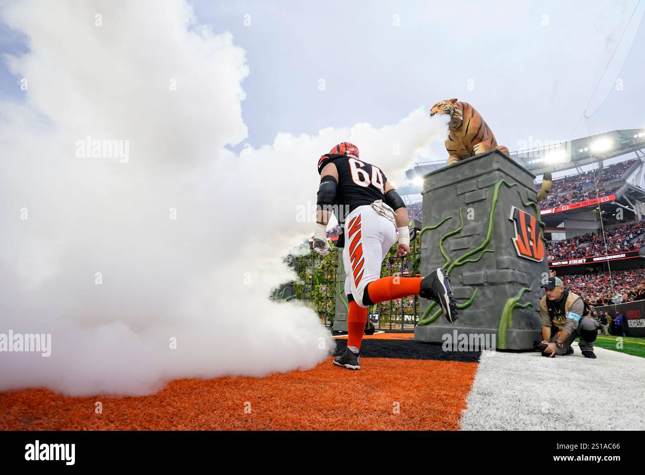 Cincinnati Bengals center Ted Karras (64) is announced prior to an NFL ...