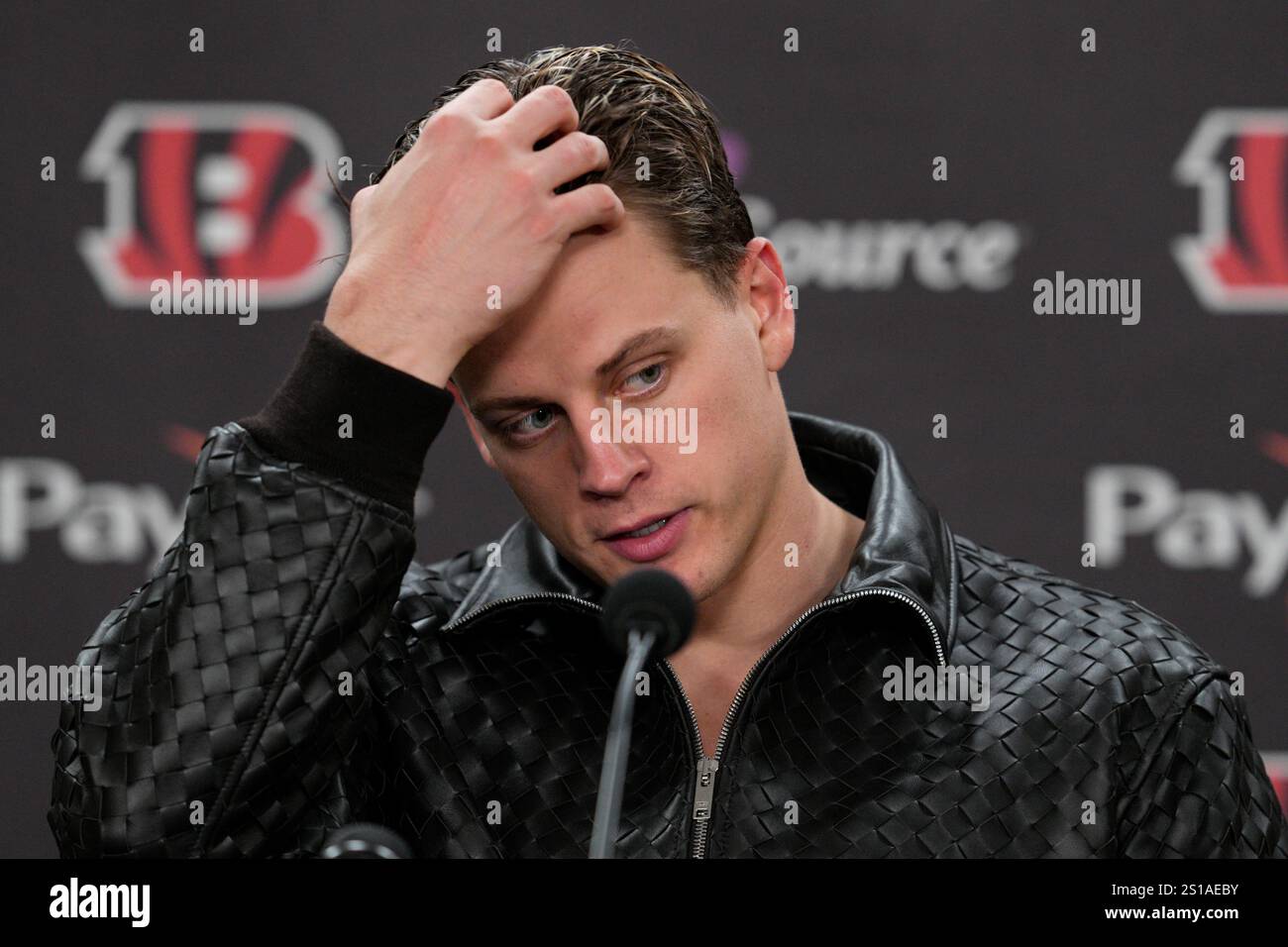 Cincinnati Bengals quarterback Joe Burrow (9) is interviewed following ...
