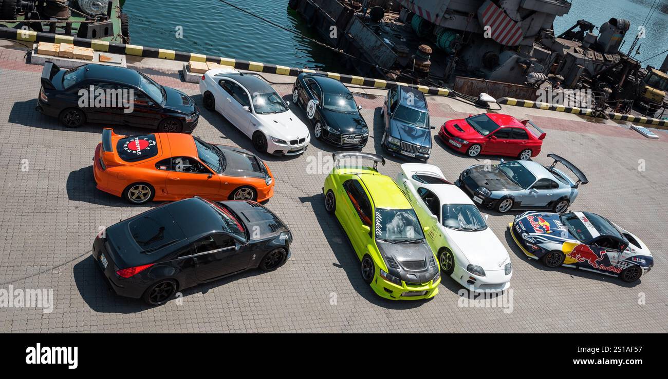 Tuned car meet - modified cars owners gathering. Eight japanese cars ...