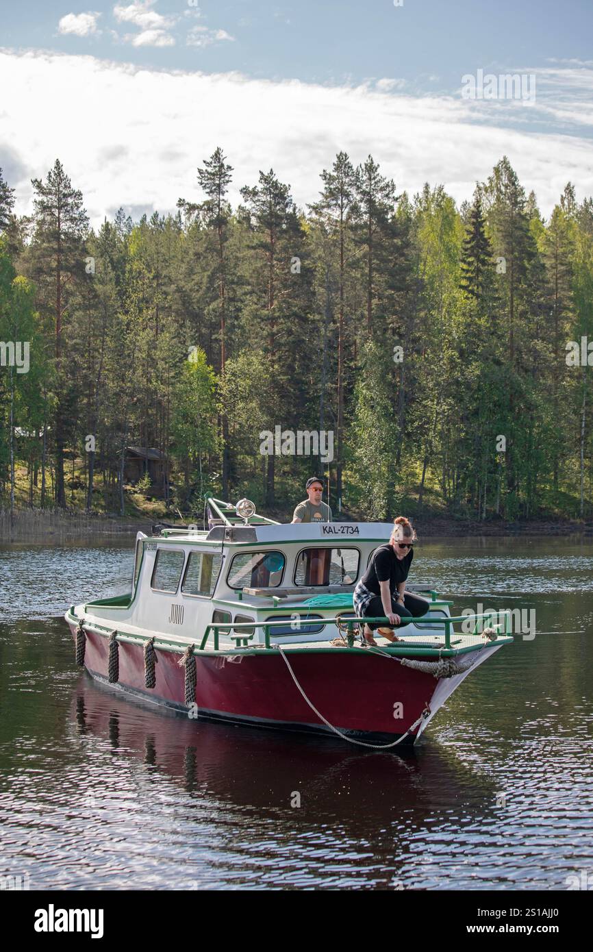Finland, Lake district, lac Saimaa, Finnish fisherman and his wife on ...