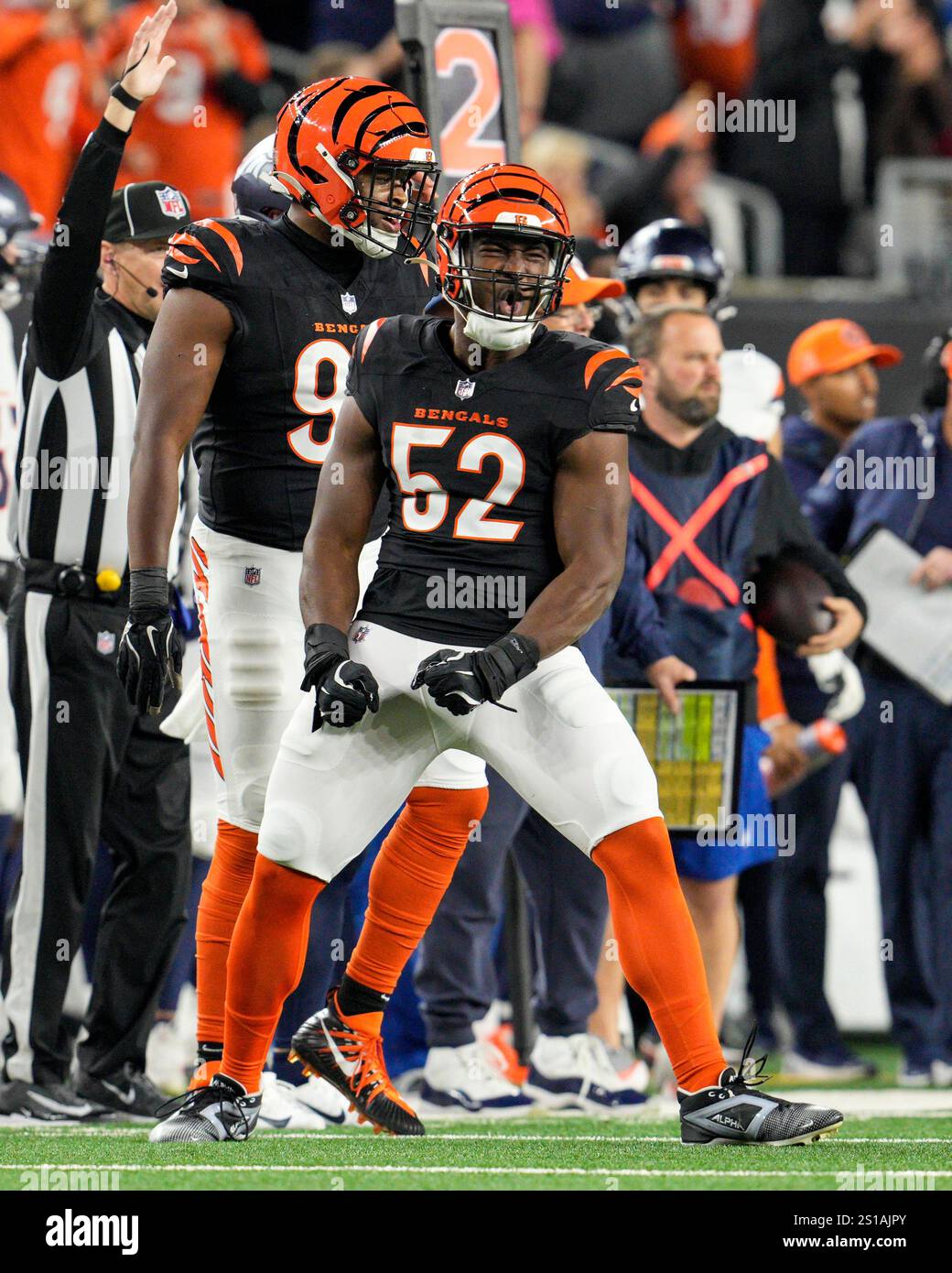 Cincinnati Bengals defensive end Cedric Johnson (52) reacts during an ...