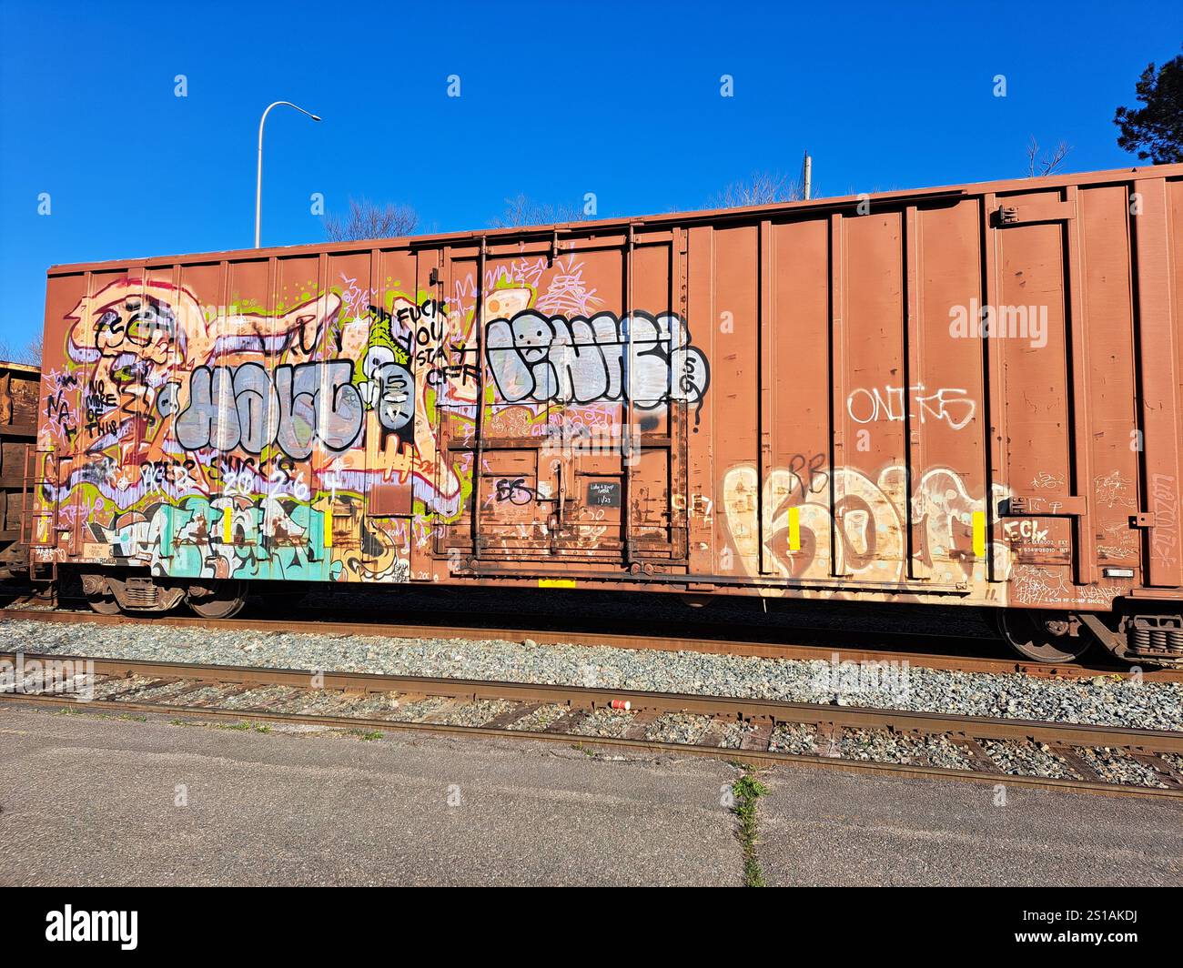 Graffiti tagged on rail cars on Station Street in downtown Saint John ...