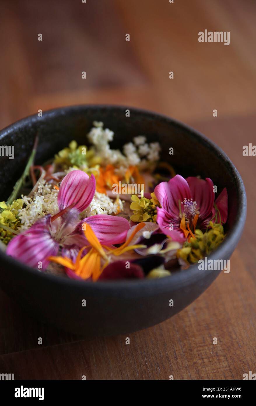 Peru, Andes, Moray, dish decorated with andean flowers by the peruvian ...