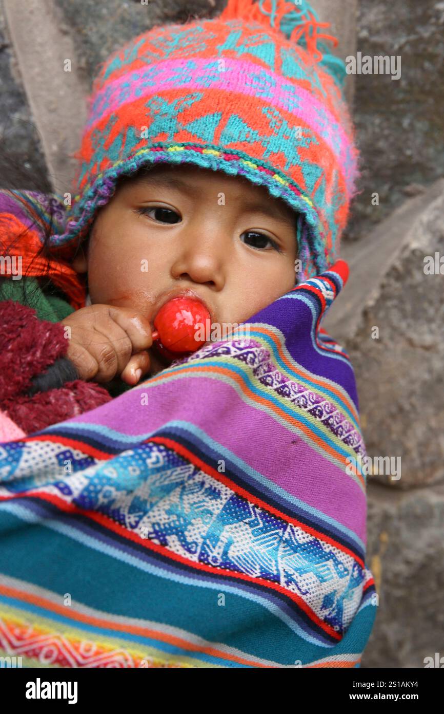 Peru, Andes, sacred valley, Pisac, Quechua babay wearing an andean ...