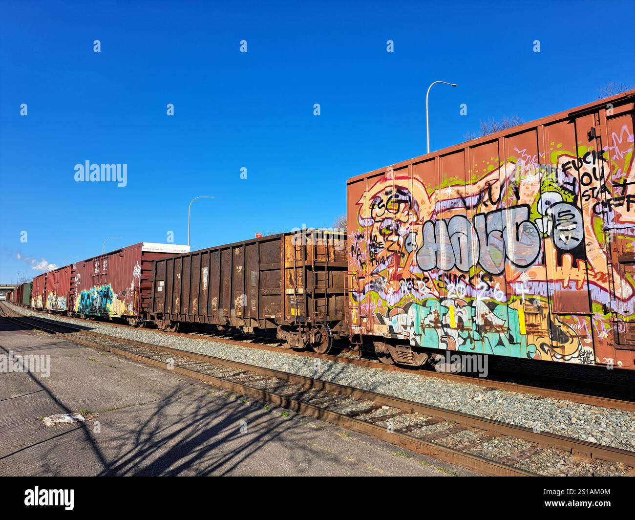 Graffiti tagged on rail cars on Station Street in downtown Saint John ...