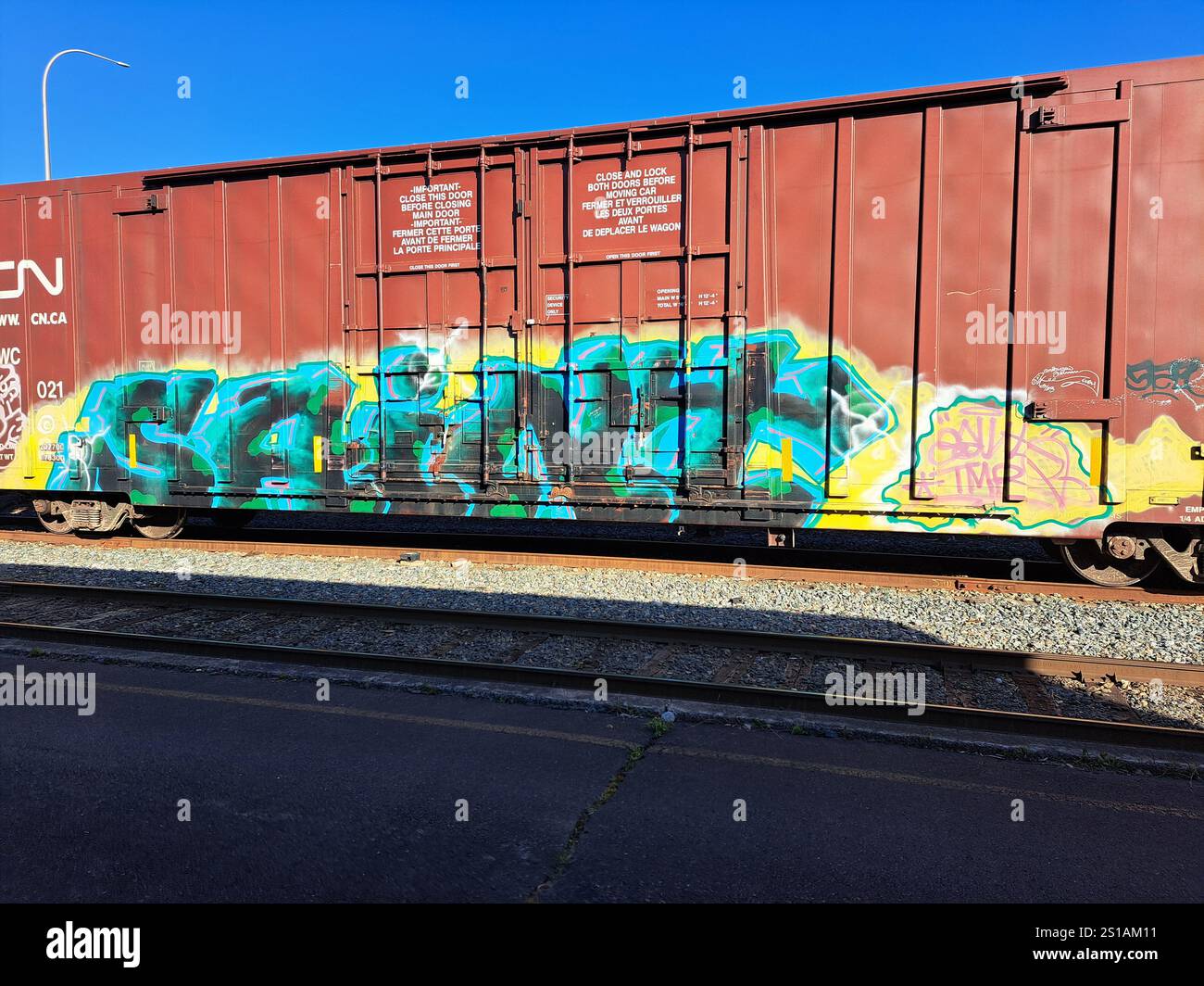Graffiti tagged on rail cars on Station Street in downtown Saint John ...