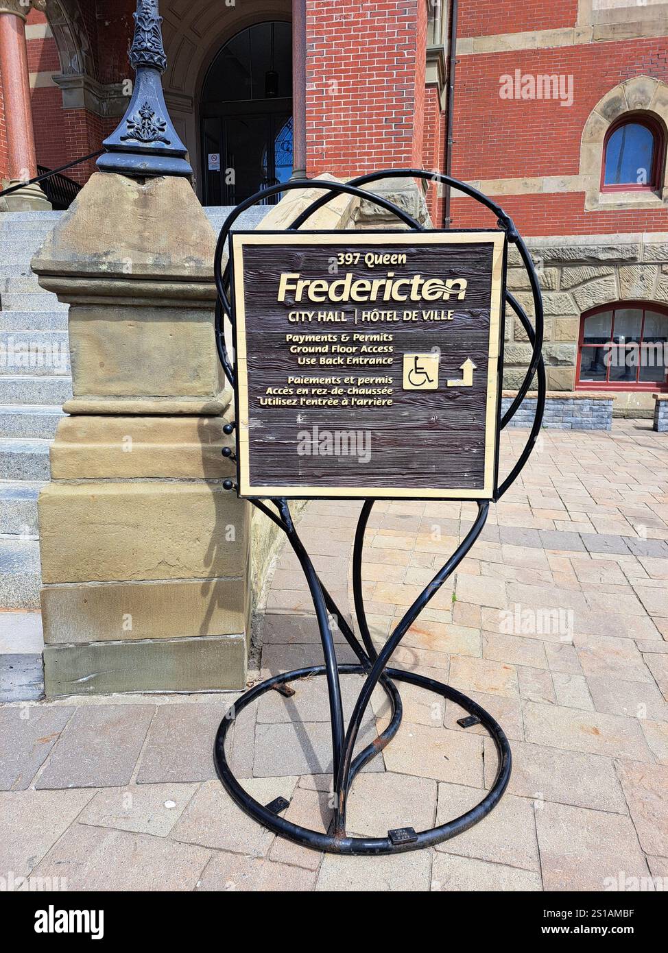 City hall sign on Queen Street in downtown Fredericton, New Brunswick ...