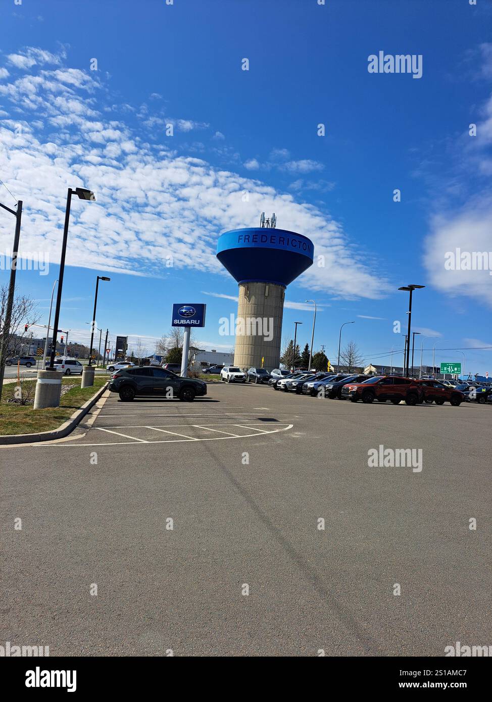 Water tower and Subaru sign on the corner of Bishop Drive and Smythe ...