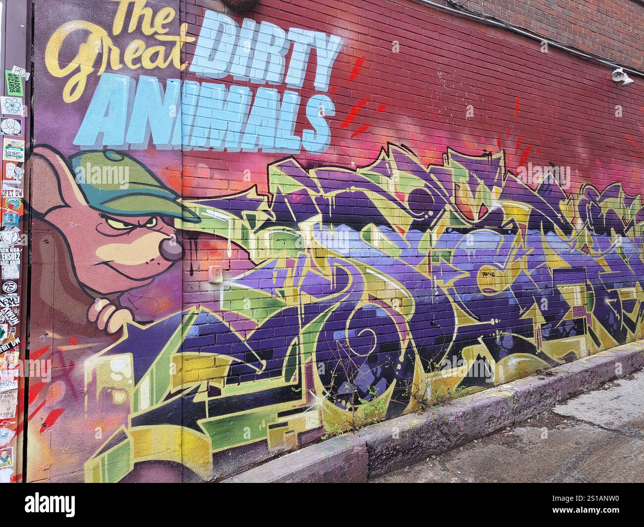 Great Dirty Animals mural in an alley near Saint-Laurent Boulevard in ...