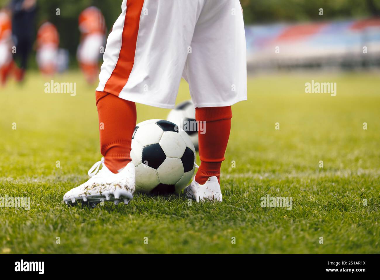 Little Kids Soccer Football Game. Legs of Child Playing Soccer on Grass ...