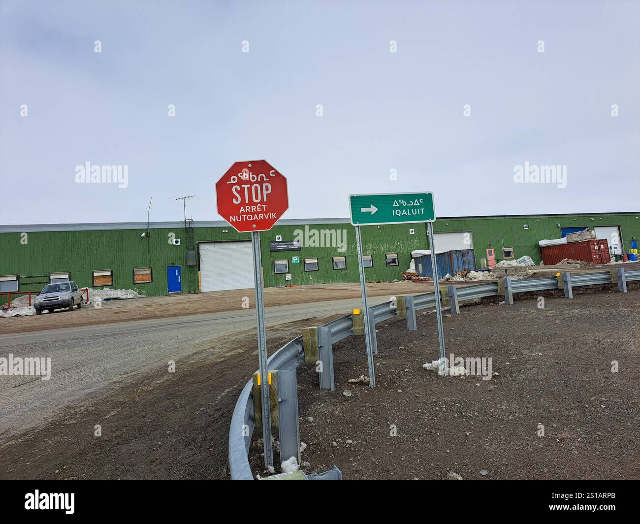 Multilingual stop and directional signs in English, French, Inuktitut ...