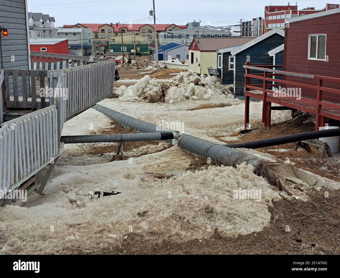 Sewer pipe lines from houses in Iqaluit, Nunavut, Canada Stock Photo ...