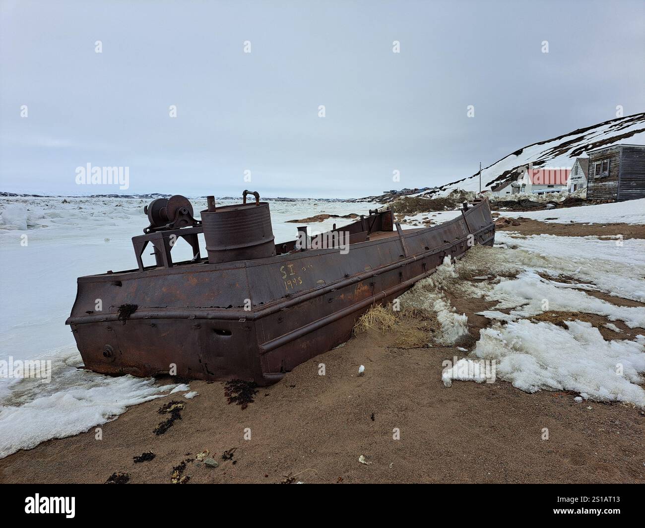 Rusty steel barge on Red Boat Beach in Apex, Nunavut, Canada Stock ...