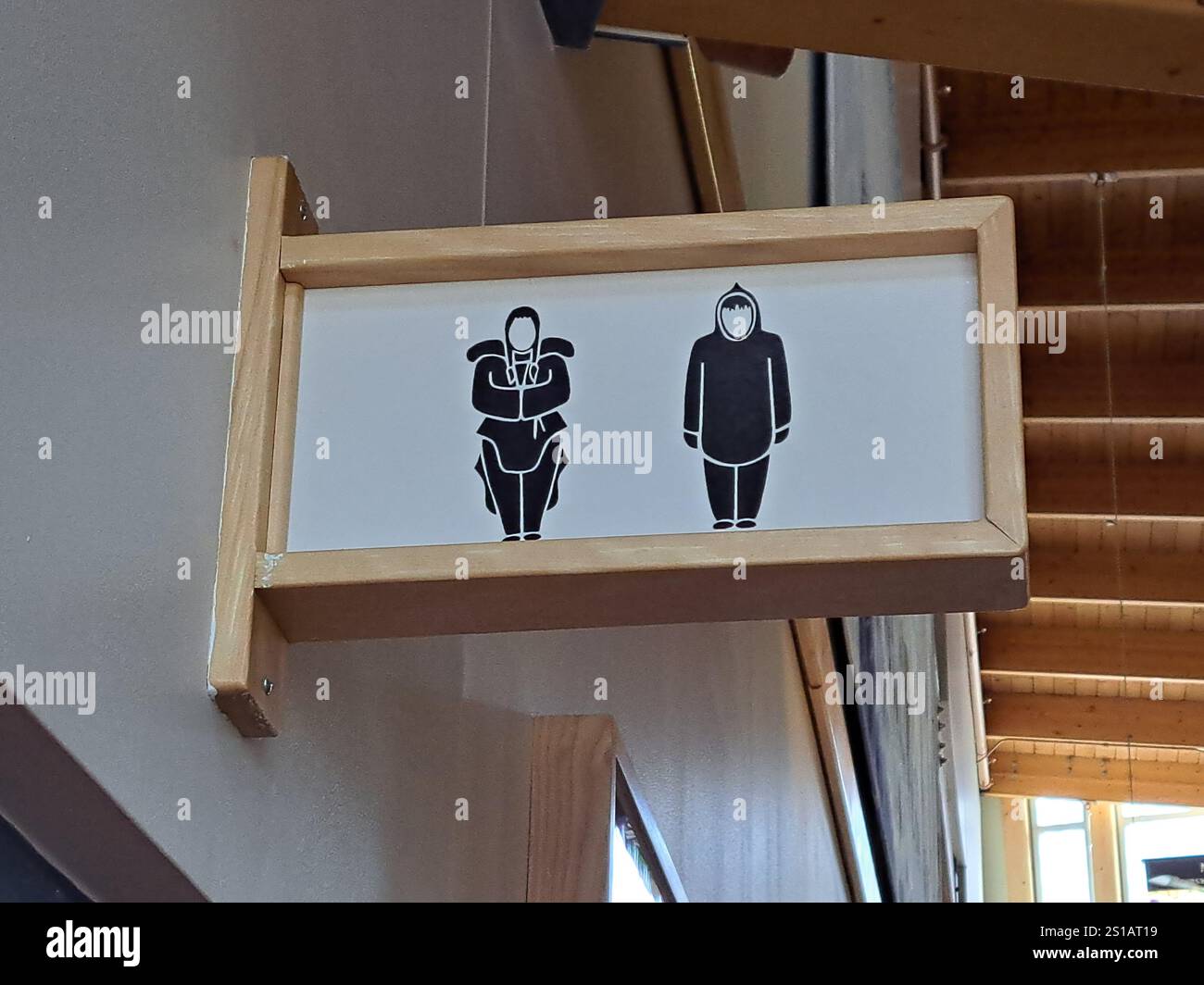 Inuit men and women washroom sign inside the Legislative Assembly of ...