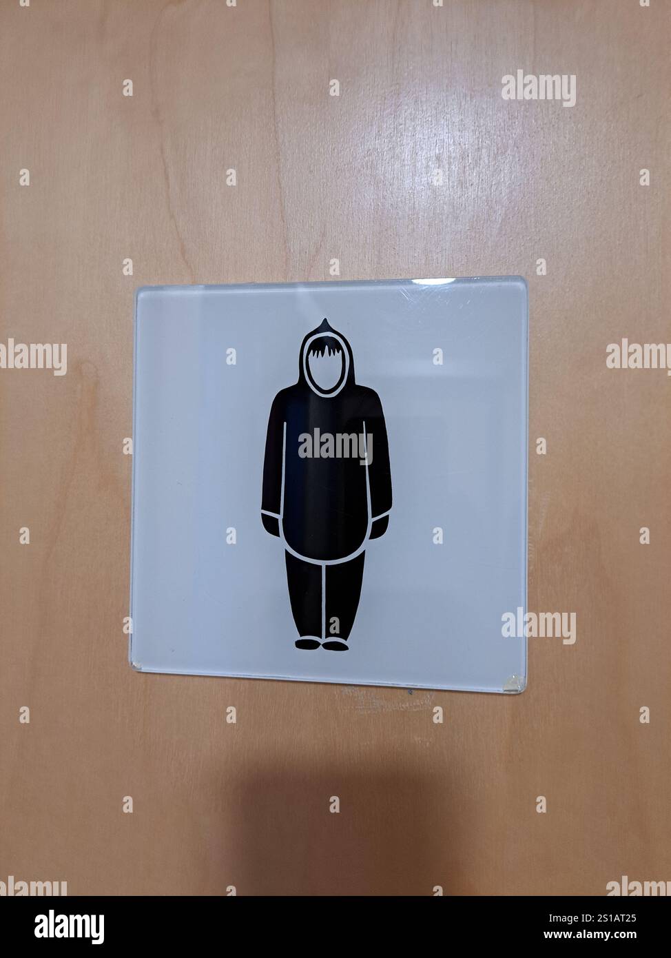 Inuit men washroom sign in the Legislative Assembly of Nunavut in ...