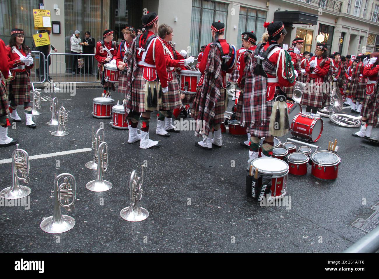 Members of the RHS Kiltie Wind Ensemble take a break ahead of the ...