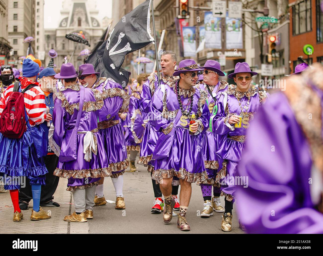 Mummers Parade 2025. Parade participants march in bright purple pirate ...