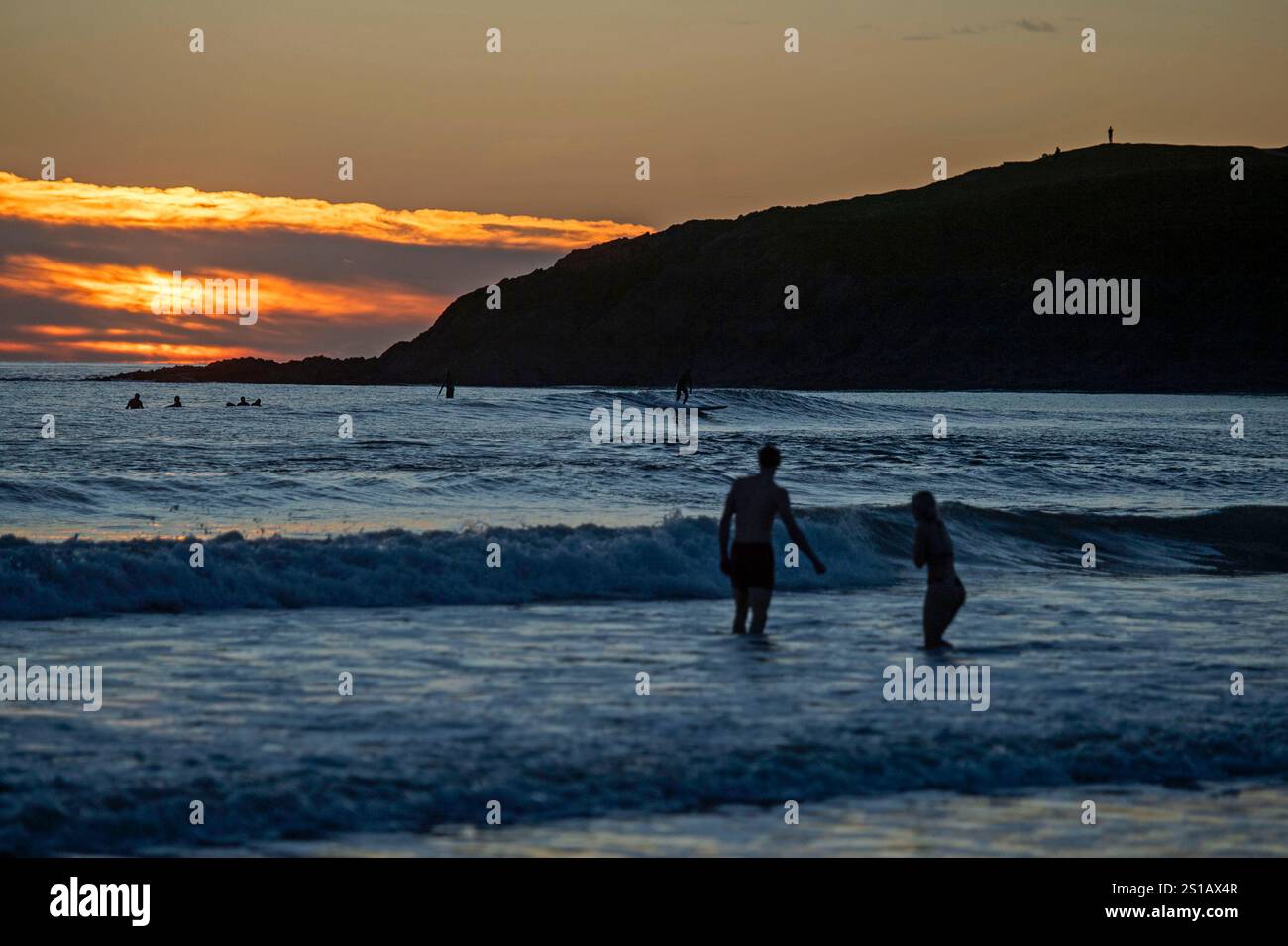 Swansea, UK. 02nd Jan, 2025. Swimmers brave the chilly seas at Langland ...