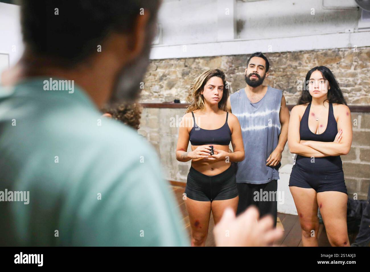(From Left to Right) Clara Winter, Nathan Soares, and Fernanda Sarriá hear from their teachers ...