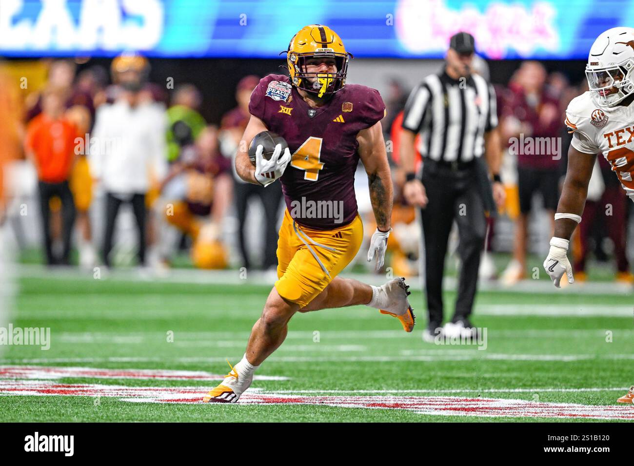 ATLANTA, GA – JANUARY 01: Running Back Cam Skattebo #4 of the Arizona ...