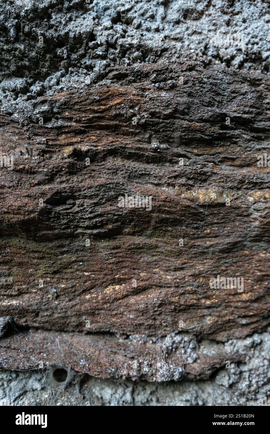 Natural rock formation with visible layers and textures creating a ...