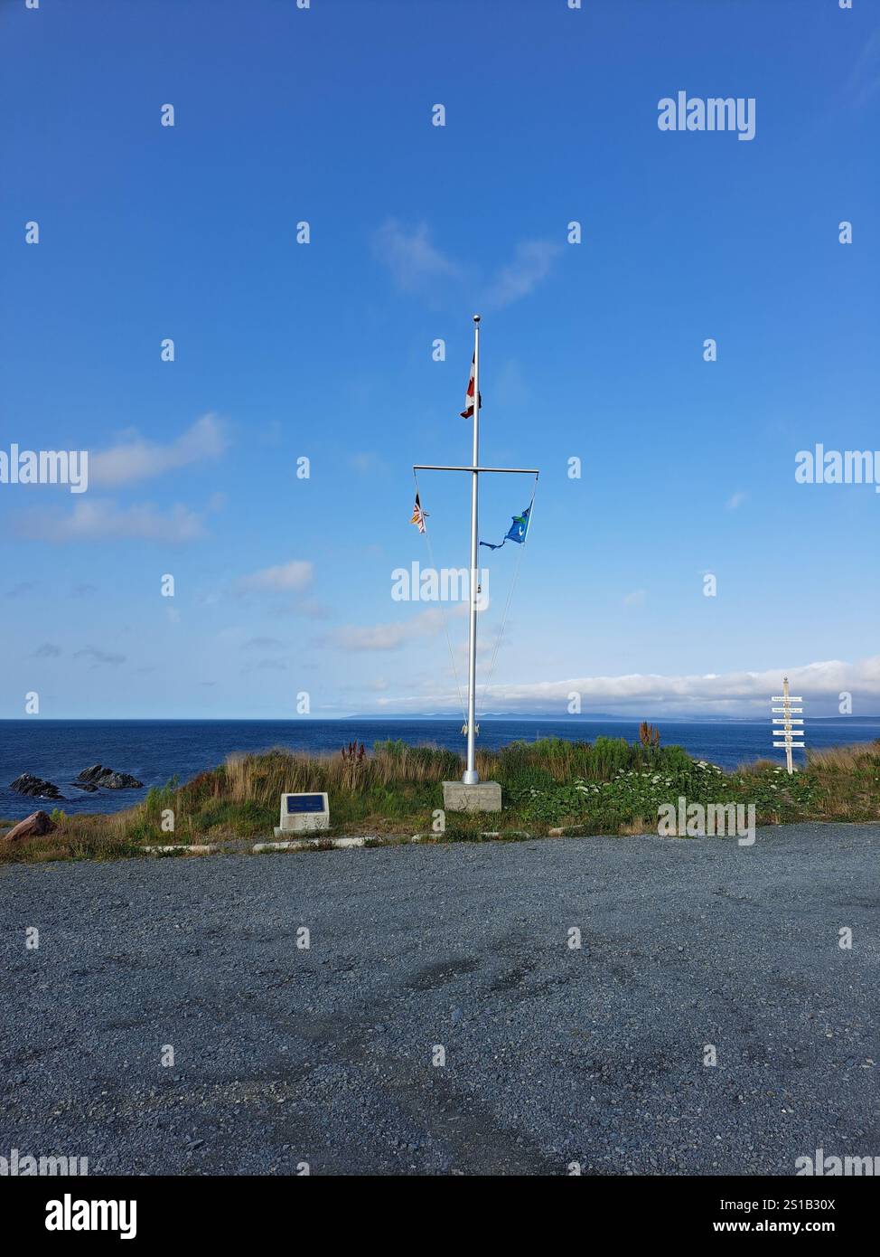 Flags flying at Green Point Lighthouse in Port de Grave, Newfoundland ...