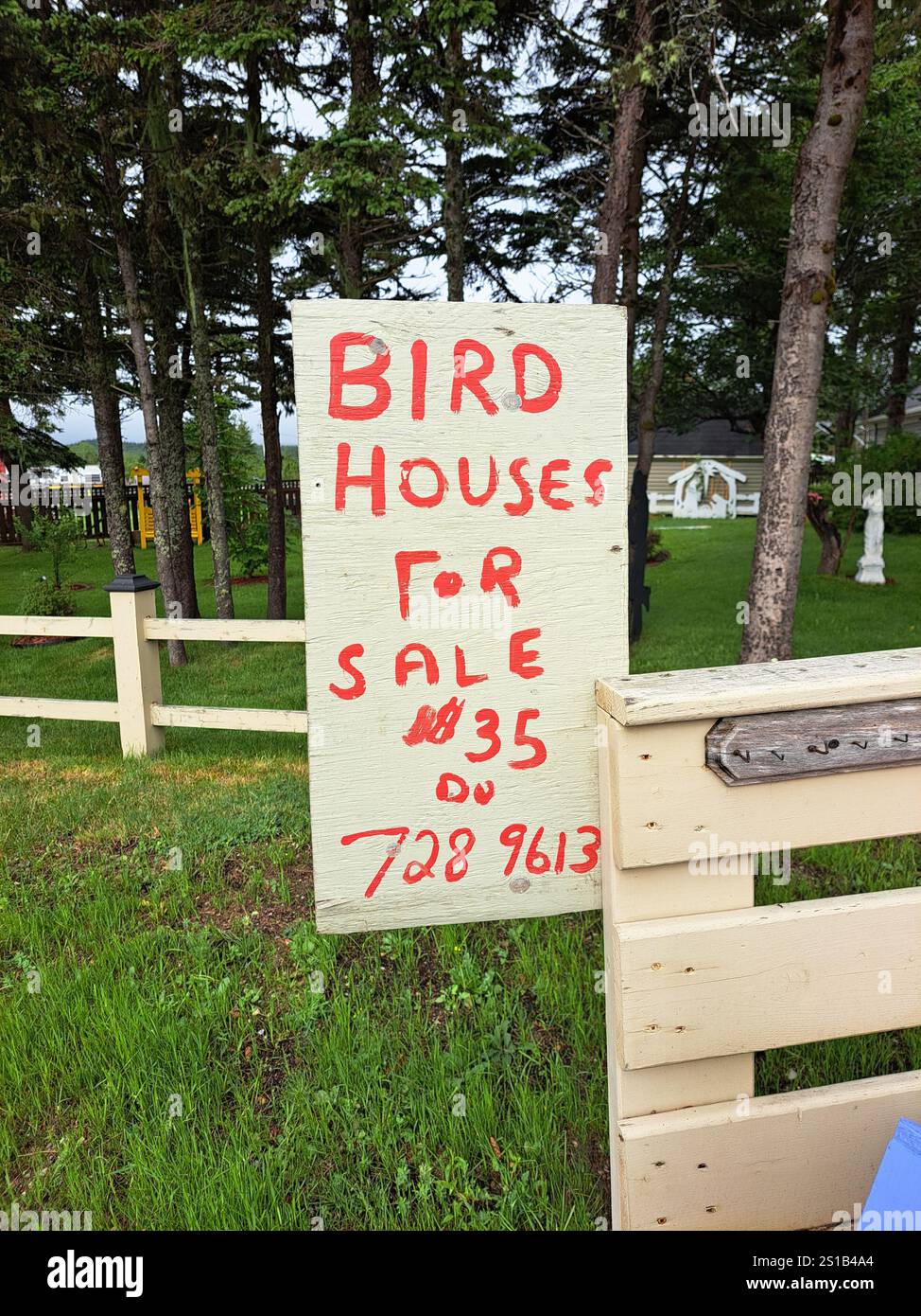 For sale sign for colorful bird houses for sale on Conception Bay ...