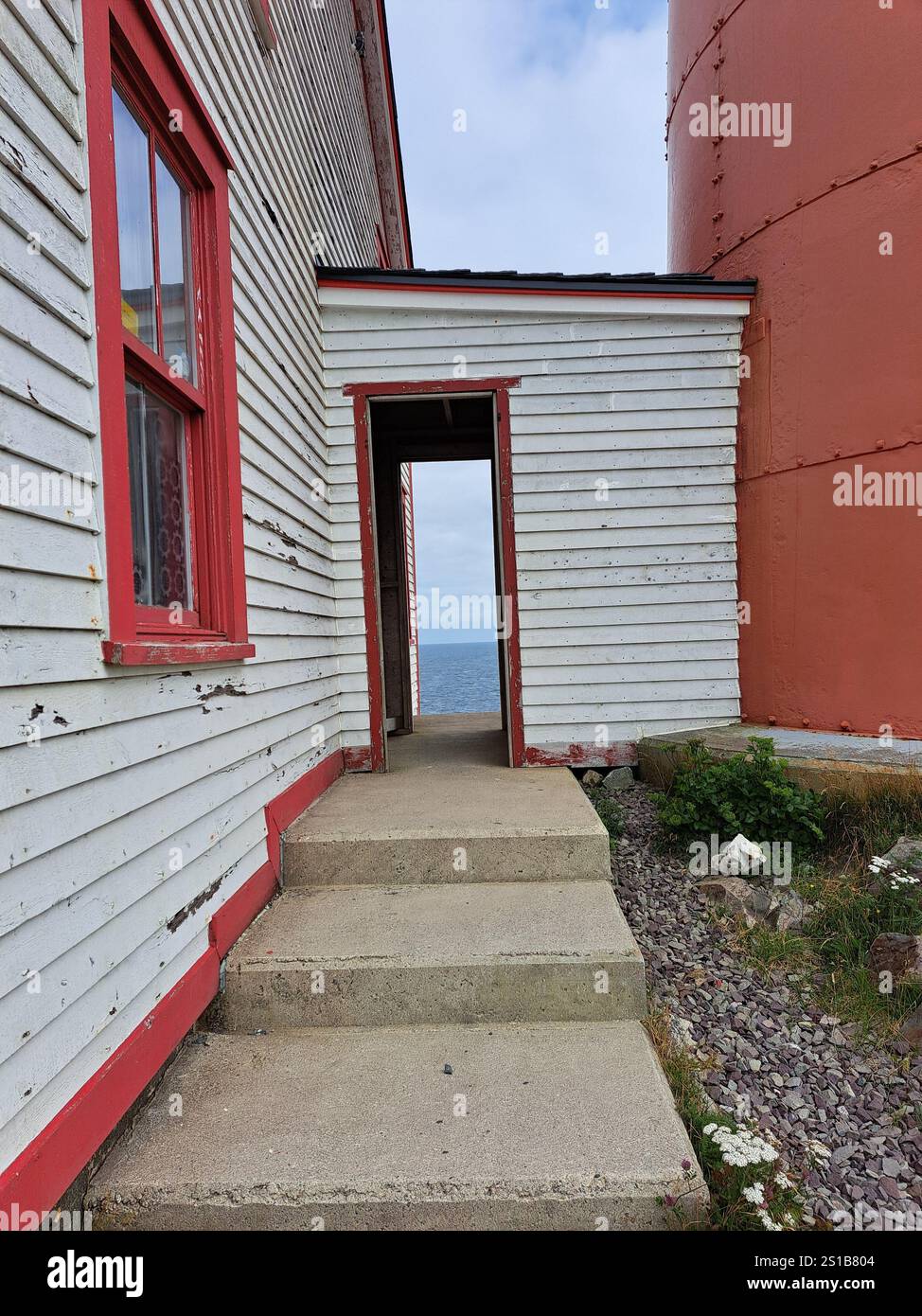 View of the water through the door of the Ferryland Lighthouse in ...