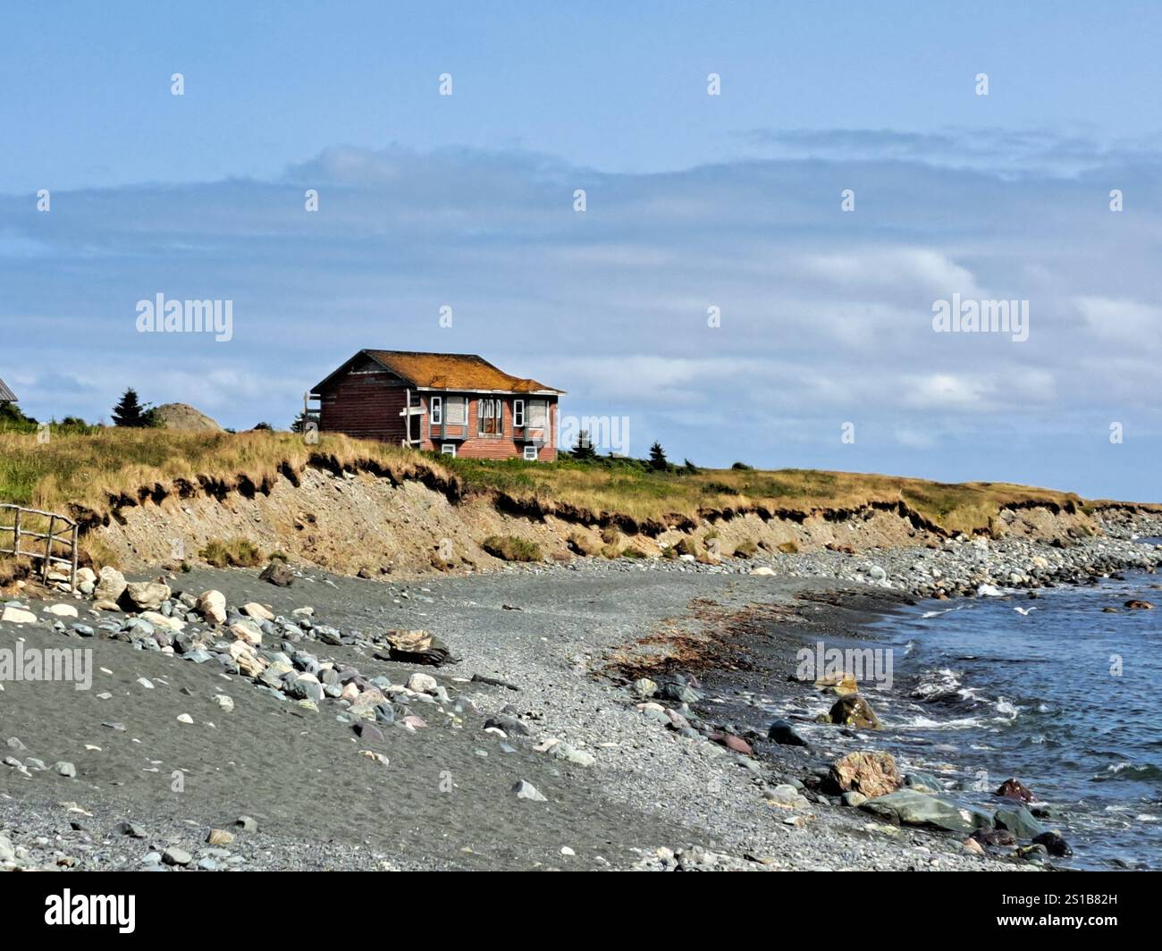 Abandoned dilapidated wooden red fixer upper by the beach in Witless ...