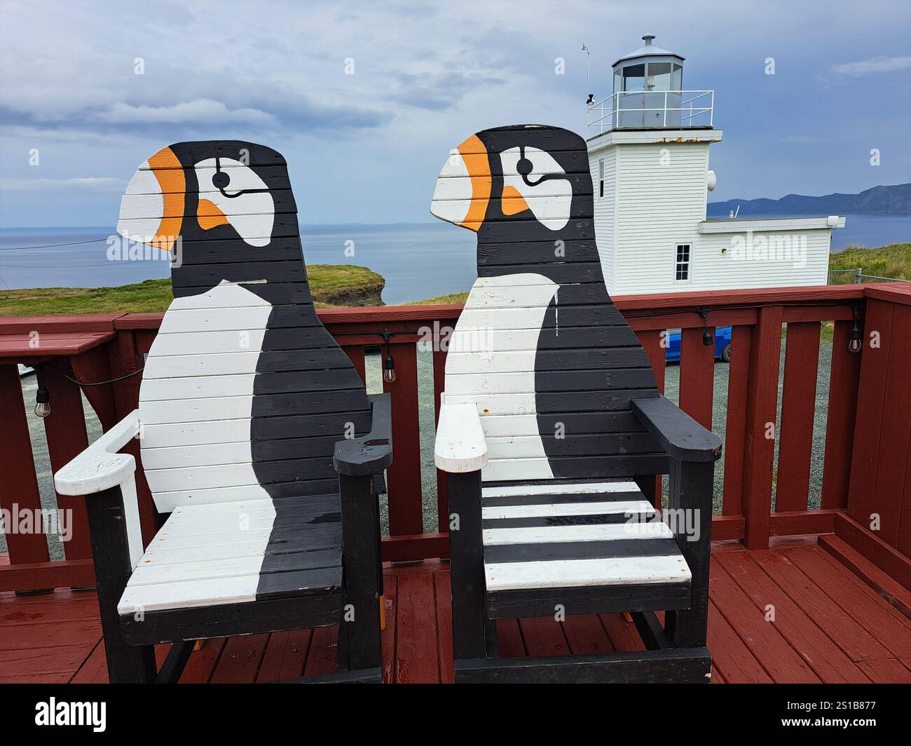 Puffin decorations on the bench at the Keeper's Cafe in Wabana, Bell ...