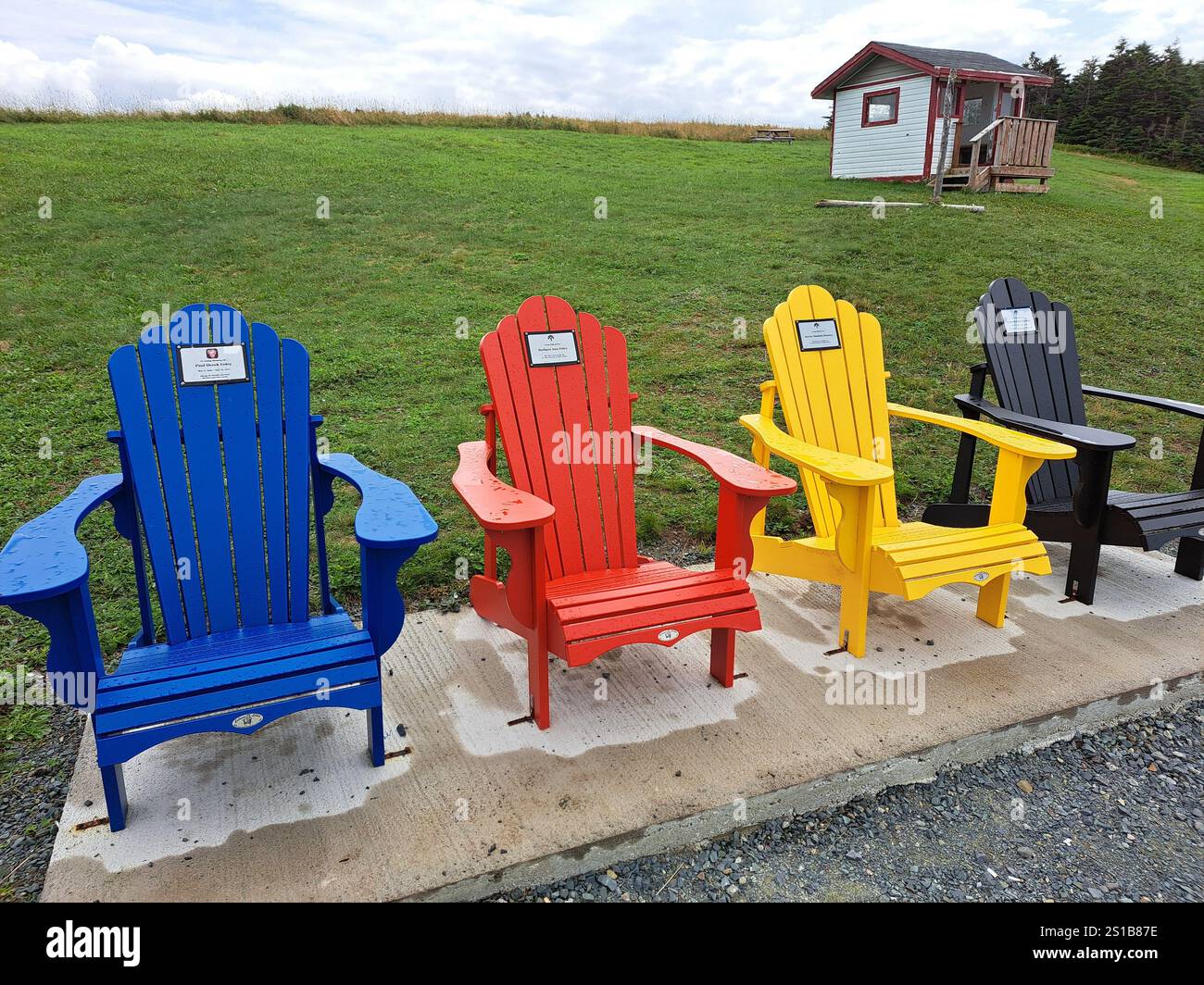 Adirondack chairs at the Bell Island light station in Newfoundland ...