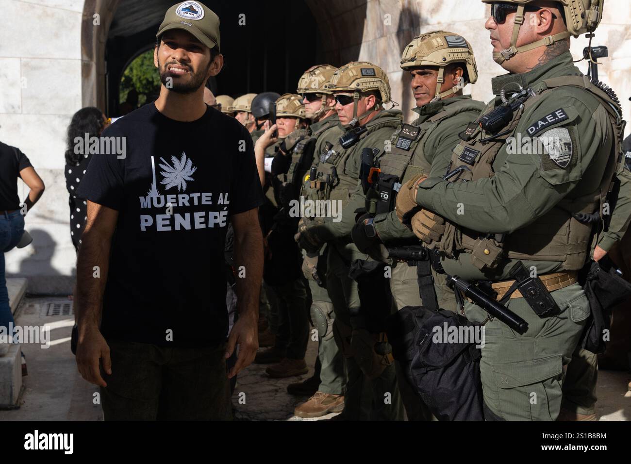 San Juan, USA. 02nd Jan, 2025. Environmental activists face off with ...