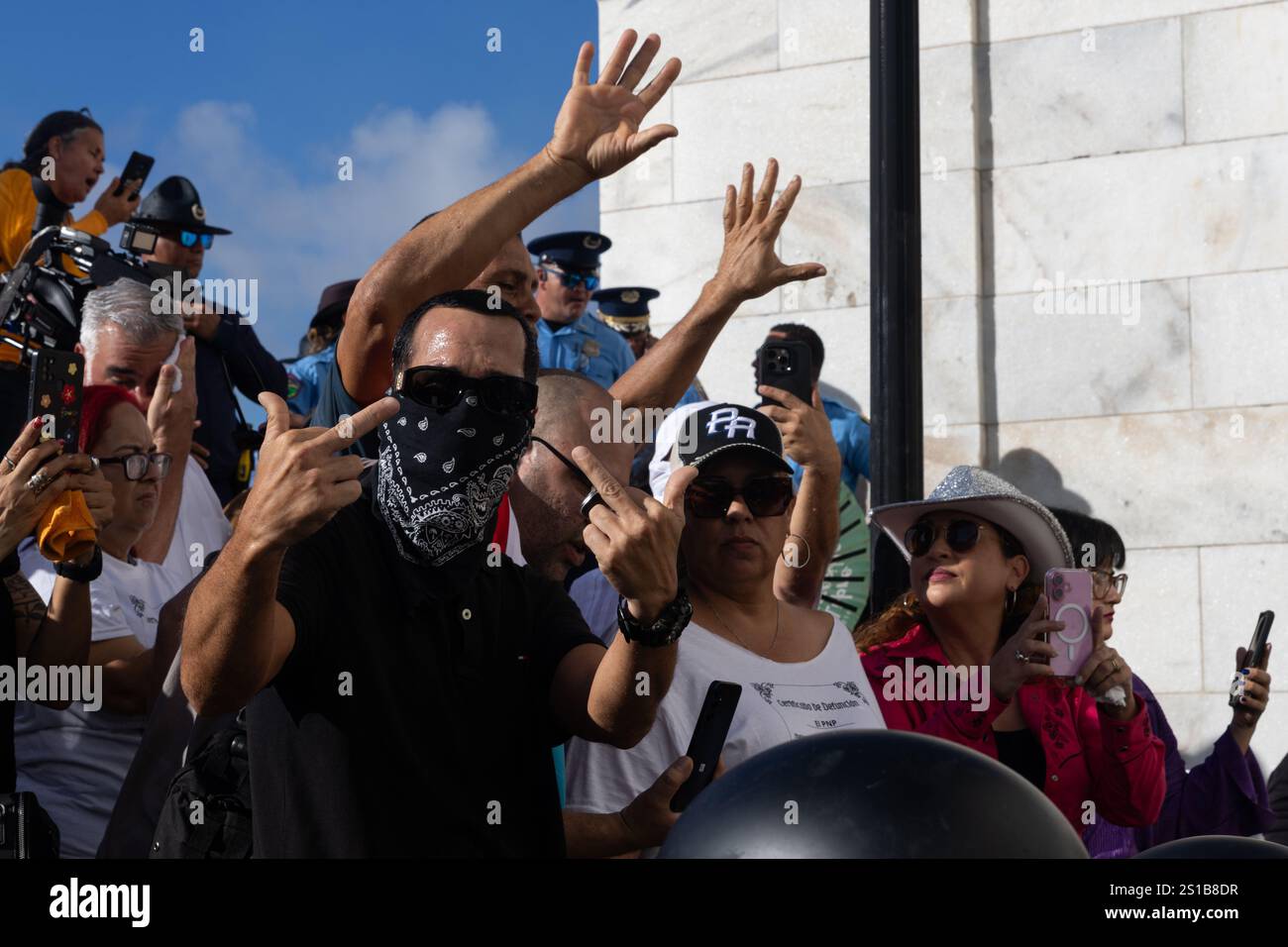 San Juan, USA. 02nd Jan, 2025. Environmental activists face off with ...